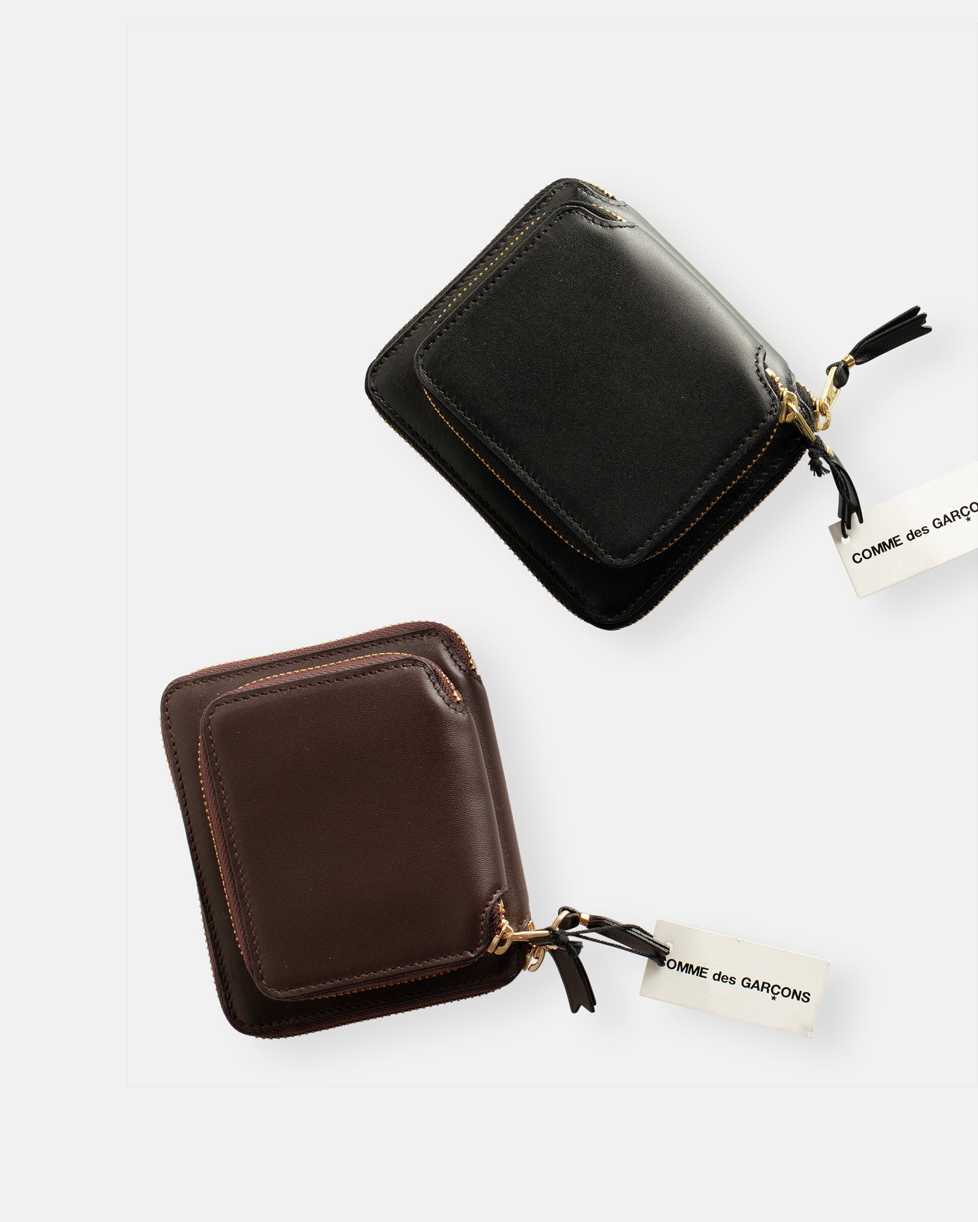 comme des garçons outside pocket zip around wallet | noodle stories